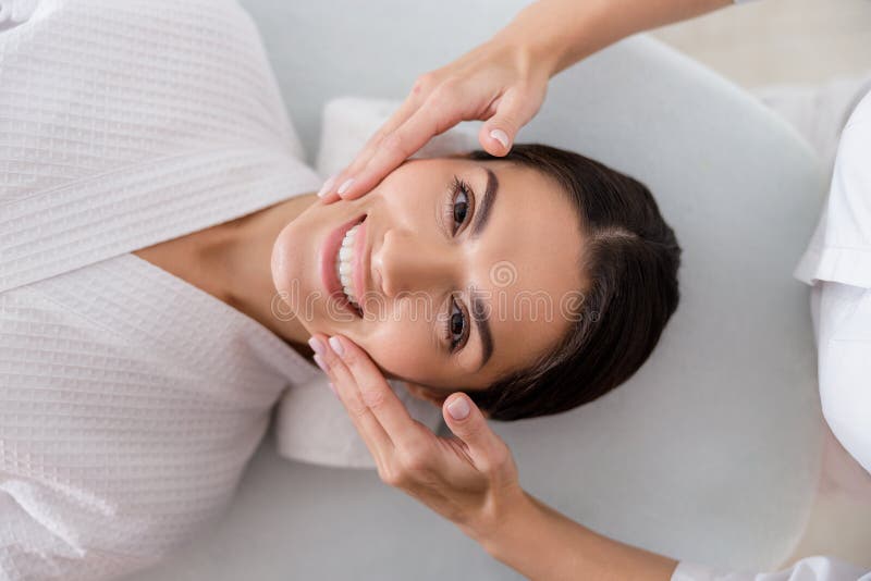 Masseuse Hands Massaging Face Of Cheerful Lady Stock Image Image Of