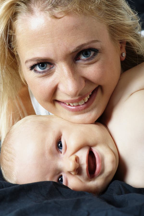 Beautiful Young Woman with Her Baby Stock Photo - Image of love, beauty ...