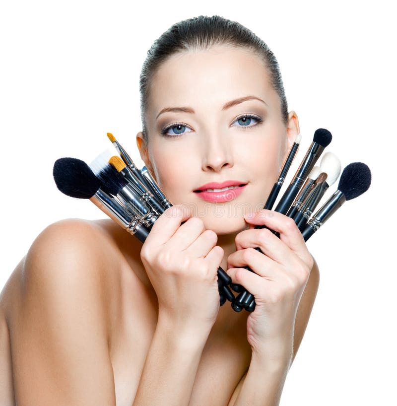 Beautiful Young Woman Holding Make-up Brushes Stock Photo - Image of ...