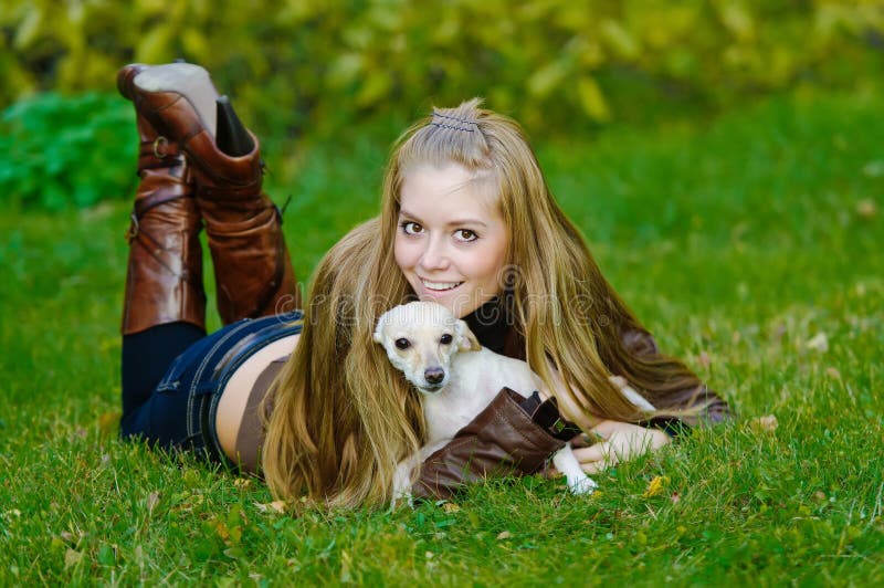 Beautiful Young Woman Hugging a Small Dog Stock Image - Image of ...