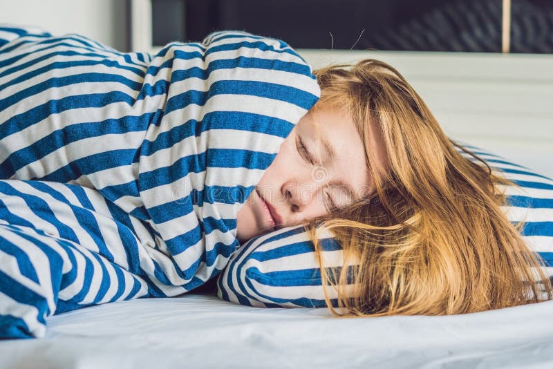 Beautiful Young Woman Lying Down in Bed and Sleeping. Do Not Get Enough ...