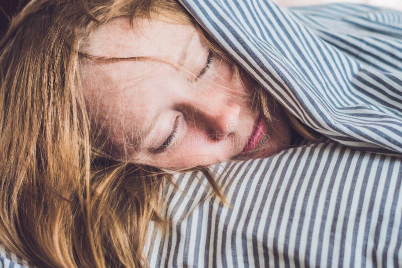 Beautiful Young Woman Lying Down in Bed and Sleeping. Do Not Get Enough ...