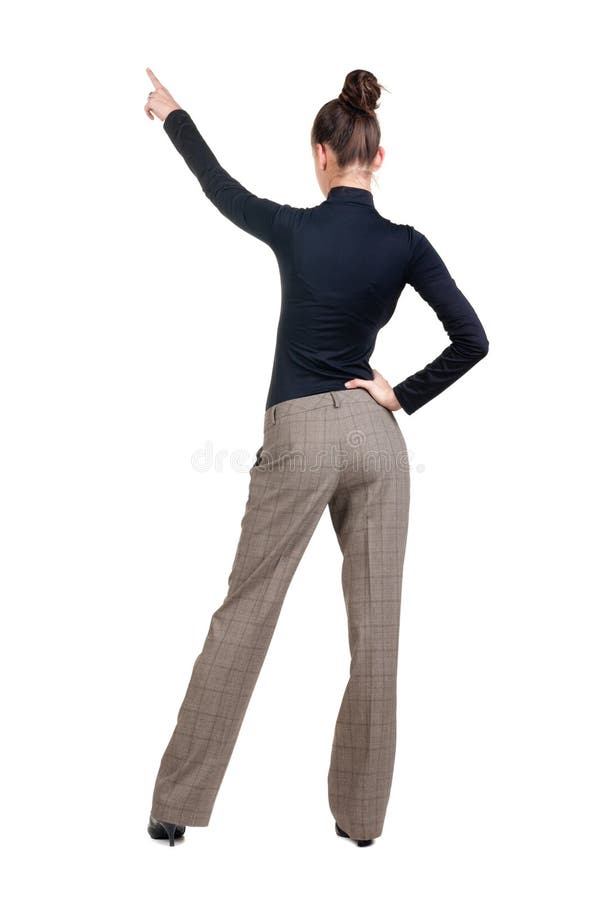 Beautiful Young Woman Pointing at Wall. Rear View Stock Photo - Image ...