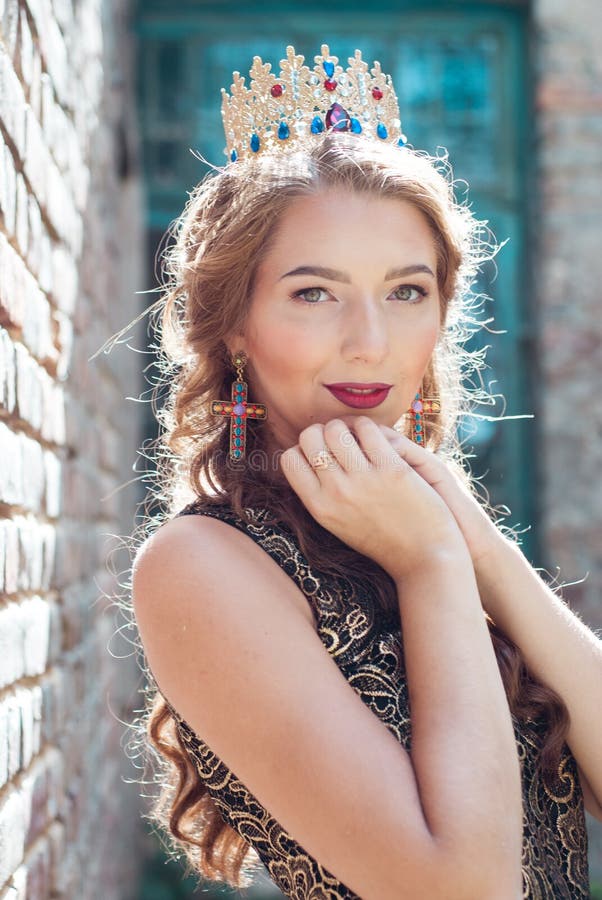 Beautiful Young Woman Posing with a Crown on Her Head Stock Photo ...