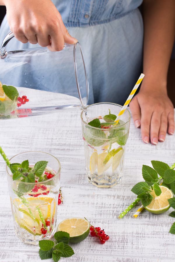 Beautiful Young Woman with Lemonade in Kitchen Stock Image - Image of ...