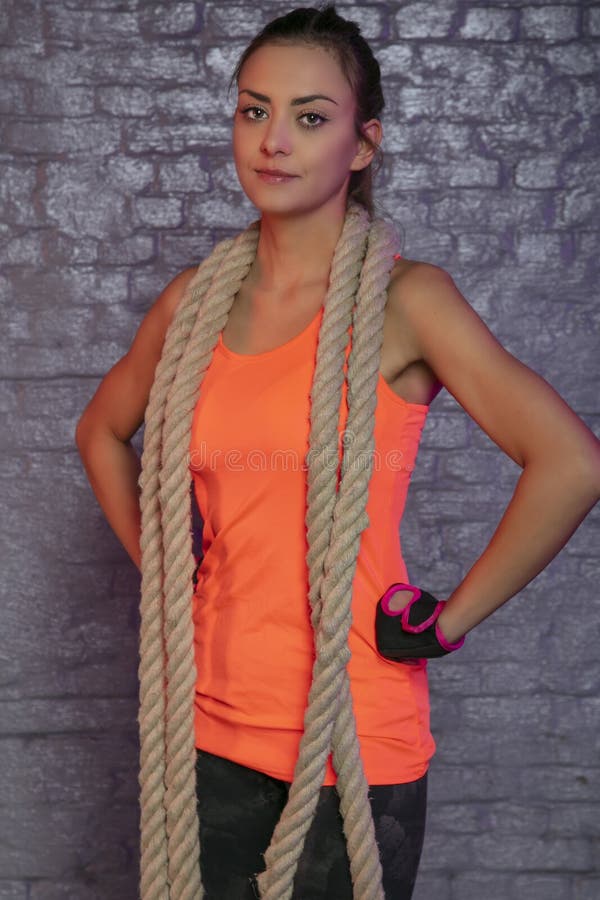 Beautiful Young Woman Practicing with a Thick Rope Stock Image - Image ...