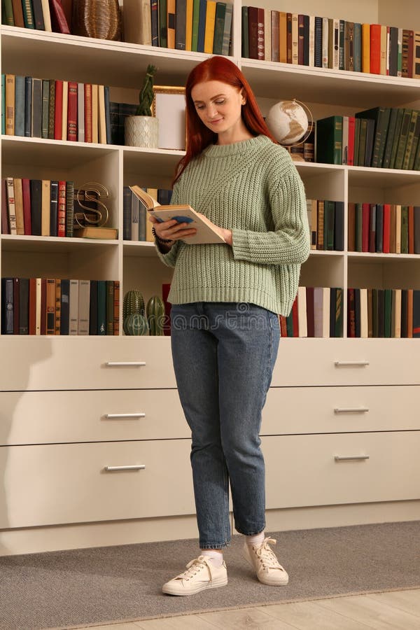 Beautiful Young Woman Reading Book in Room. Home Library Stock Image ...