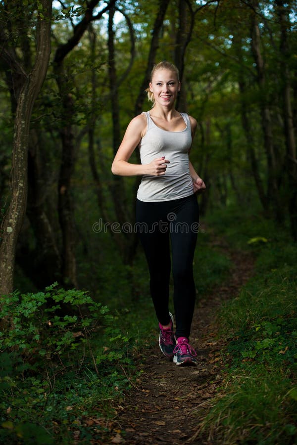 Beautiful Young Woman Runs in Forest - Active Runner Running Stock ...