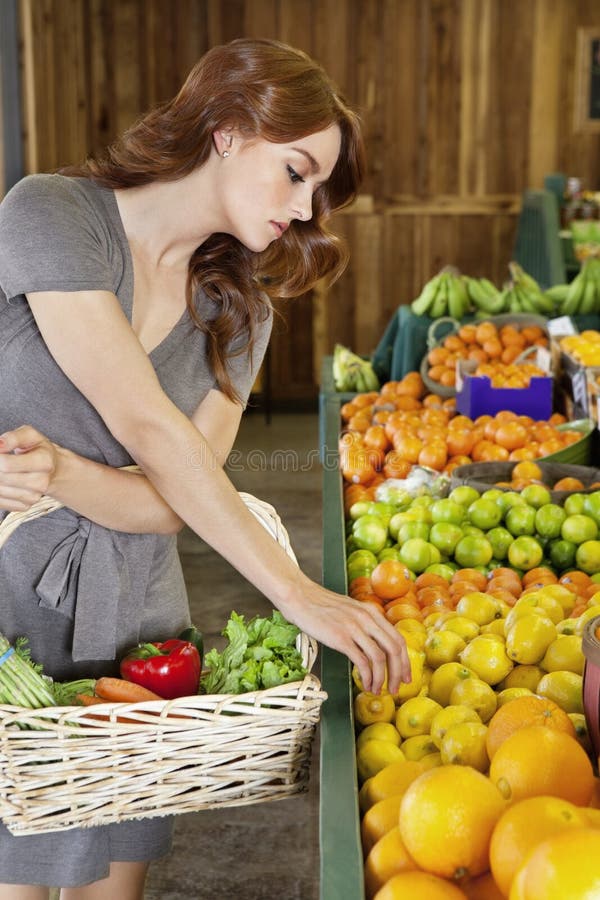 Beautiful Young Woman Selecting Fruit in Market Stock Image - Image of everyday, holding: 29674151
