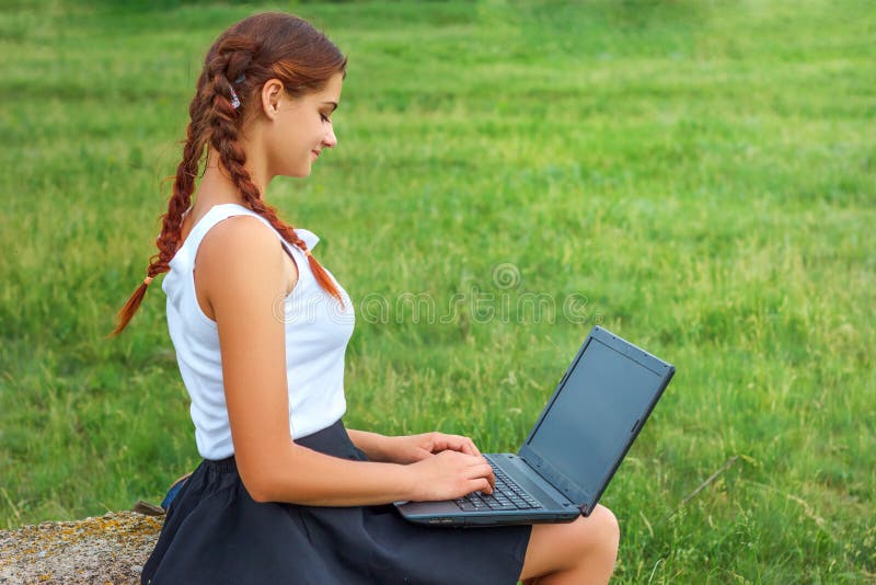 Beautiful Young Woman Sitting On Grass With Laptop Stock Image Image