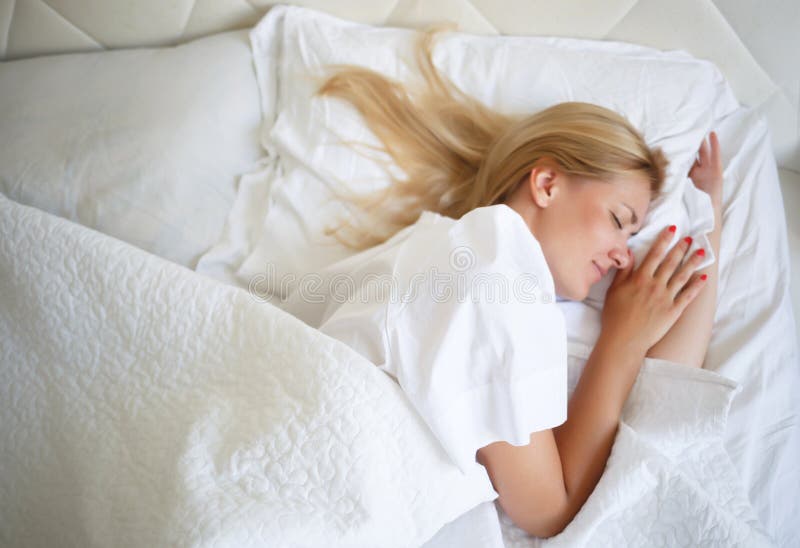 Beautiful Young Woman Sleeping on White Bed Stock Photo - Image of ...