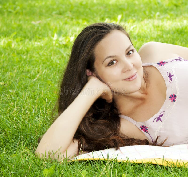 Beautiful Young Woman Smiling on Grass Field Stock Image - Image of ...