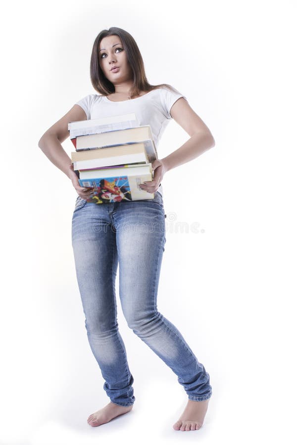 Beautiful Woman Standing and Holding Heavy Books Stock Image - Image of ...