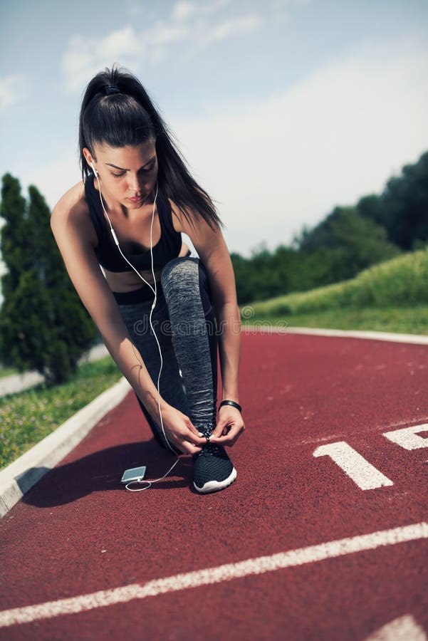 Beautiful Young Woman at Start Line Ready To Run Stock Image - Image of ...