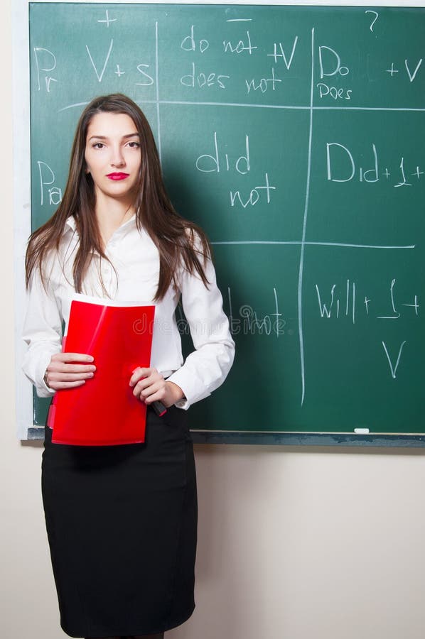Beautiful Young Woman Teaching Stock Photo - Image of girl, lesson ...