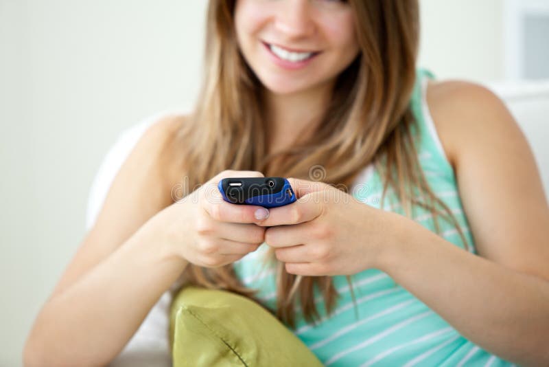 Beautiful Young Woman Texting with Her Cellphone Stock Image - Image of ...