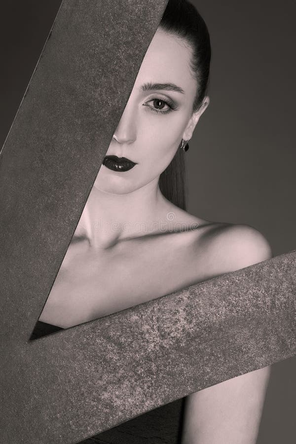 Beautiful Young Woman in Triangle Stock Image - Image of paper, dress ...