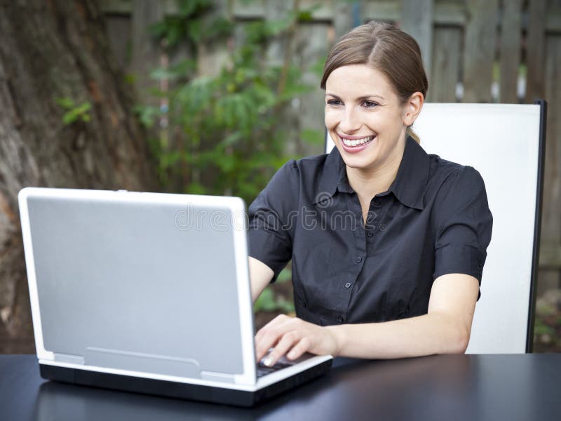 Beautiful Young Woman Using Laptop Outside Stock Image - Image of ...