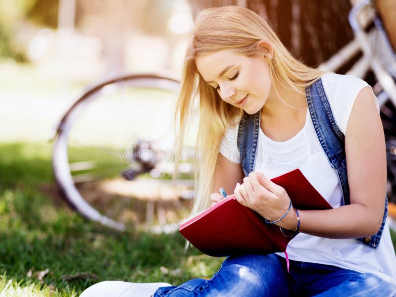 Beautiful Young Woman Writing in Her Diary Outdoors Stock Image - Image ...