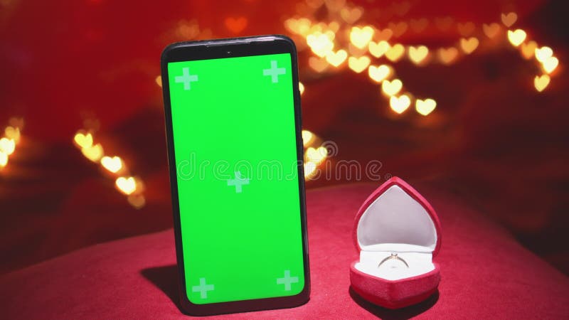 A Beautifully Arranged Romantic Proposal Setup Featuring a Smartphone ...