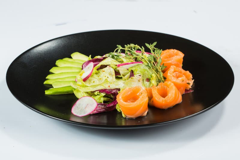 Beautifully Cooked Fish in a Plate. Salted Pieces of Red Trout Stock ...