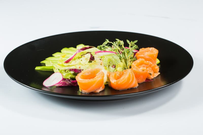 Beautifully Cooked Fish in a Plate. Salted Pieces of Red Trout Stock ...