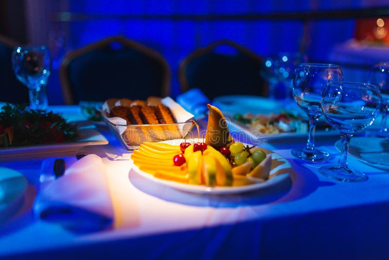 Beautifully Decorated Evening Dinner Table, Fresh Sliced Fruits ...