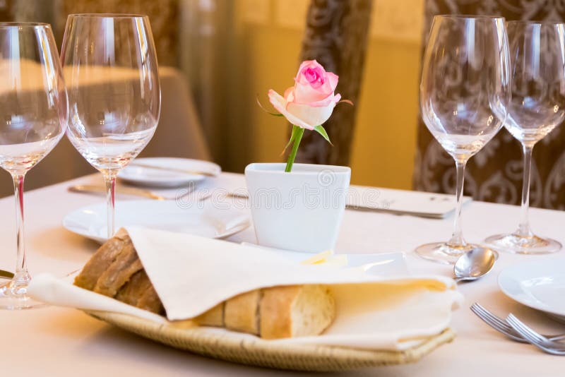 Beautifully Decorated Table in the Restaurant. on the Table is a Vase ...