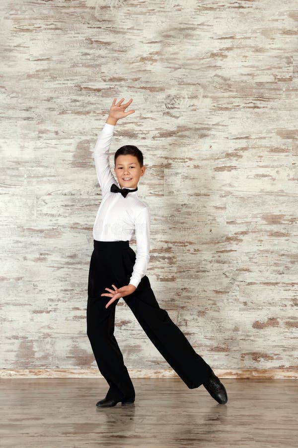 Beautifully Dressed Little Boy Dancing in Studio Stock Image - Image of ...