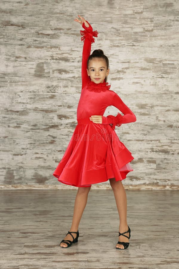 Beautifully Dressed Little Girl Dancing in Studio Stock Image - Image ...