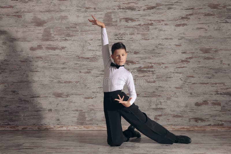 Beautifully Dressed Little Boy Dancing in Studio Stock Image - Image of ...