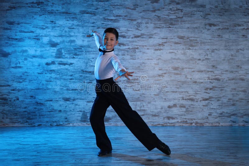 Beautifully Dressed Little Boy Dancing in Studio Stock Photo - Image of ...