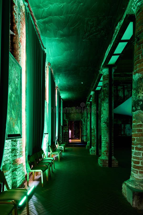 A Beautifully Illuminated Green Corridor Set within a Modern ...