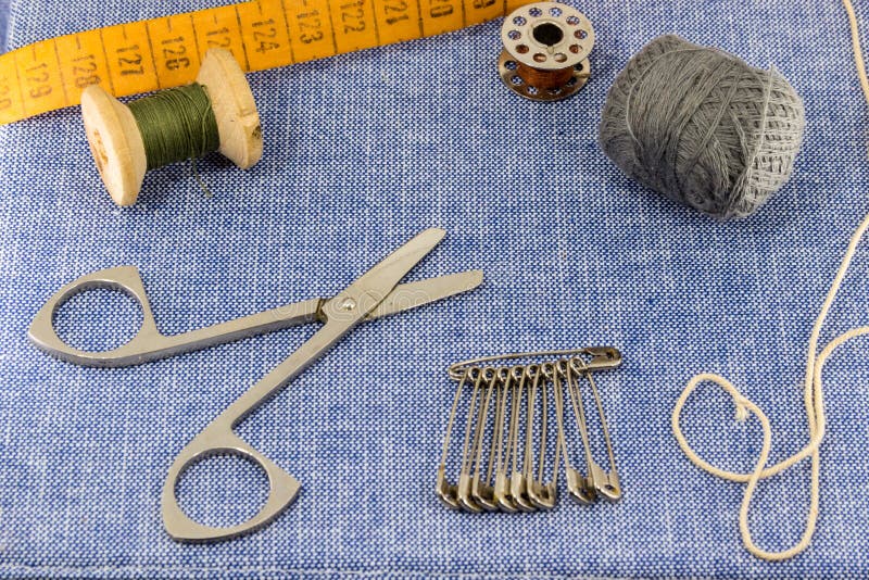 Beautifully Laid Out Accessories for Needlework on a Jeans Background ...