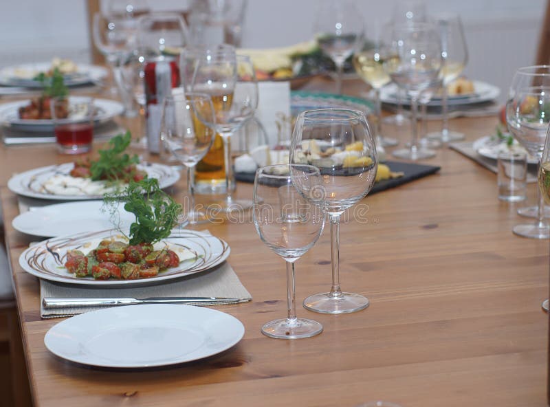 Beautifully Served Table with Drinks, Snacks and Caprese Salad Stock ...
