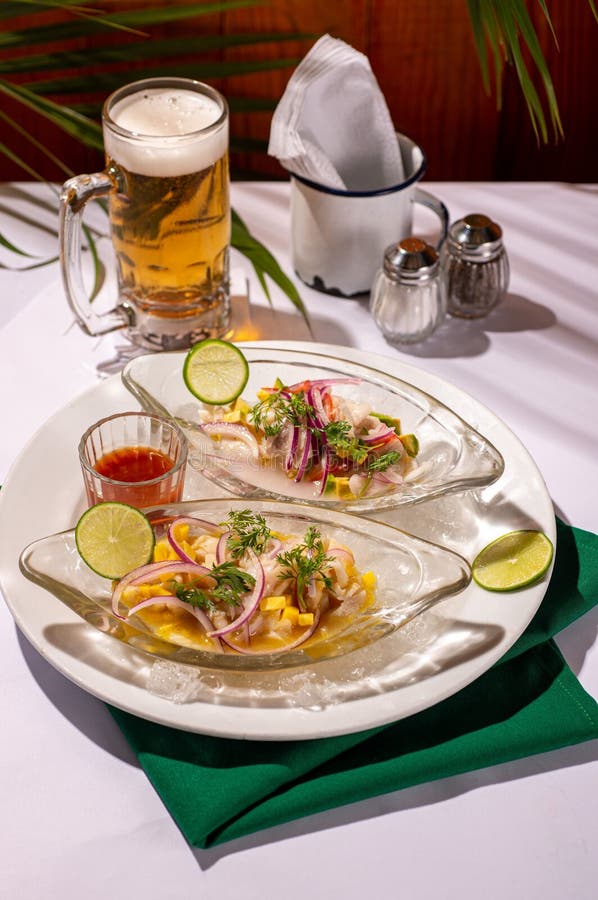 Beautifully Set Dinner Table with Freshly Prepared Ceviche and a Glass ...