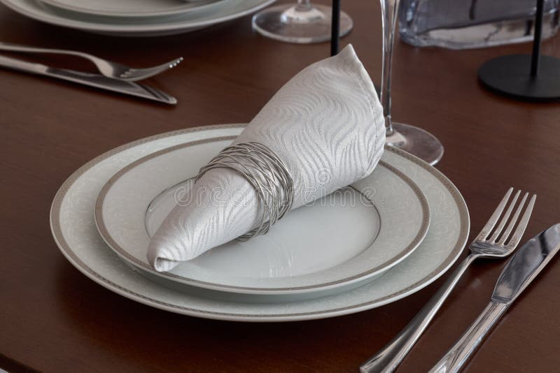 An Elegant Table Setting Featuring a Beautifully Arranged Decorative ...