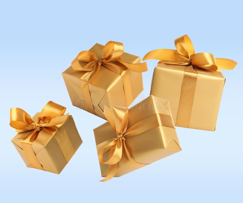 Beautifully Wrapped Gift Boxes Flying on Light Blue Background Stock ...