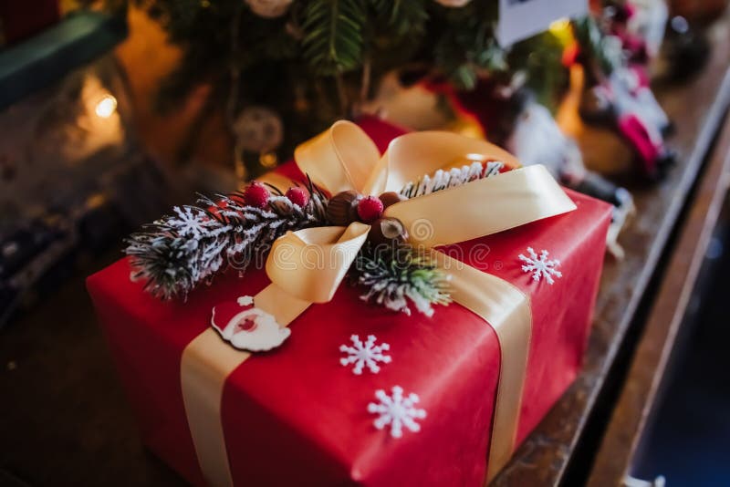 Beautifully Wrapped Red Gift Box Under the Christmas Tree, Top View ...