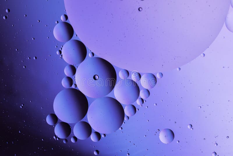 The Beauty of Abstract Oil Floating on the Water Surface with Colored ...