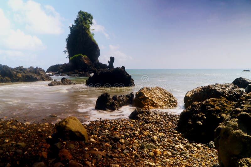 The Beauty of the Beach with Cliffs, Waves and Trees on Karang Agung ...