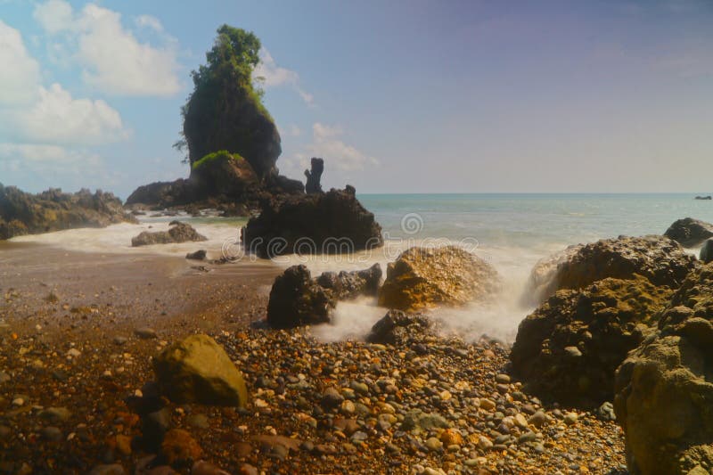 The Beauty of the Beach with Cliffs, Waves and Trees on Karang Agung ...