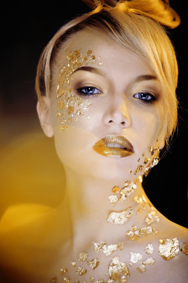 Beauty Blond Woman with Gold Creative Make Up Stock Photo - Image of ...