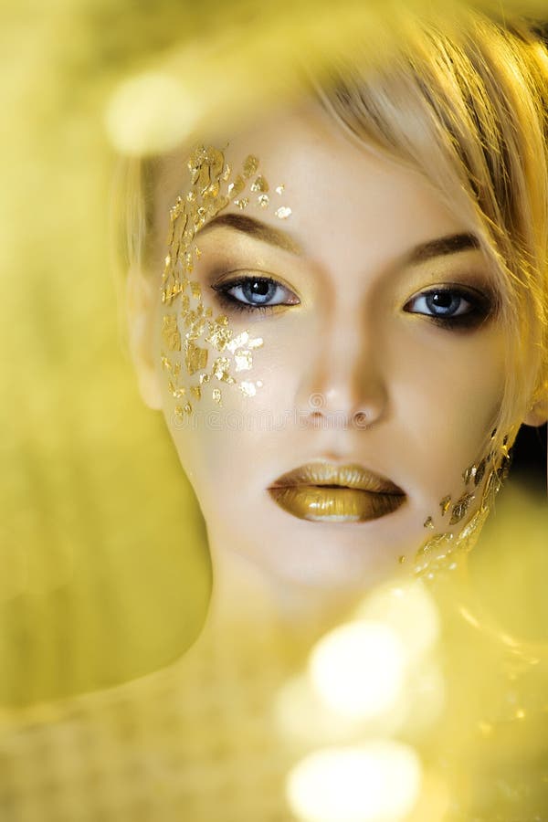 Beauty Blond Woman with Gold Creative Make Up Stock Photo - Image of ...