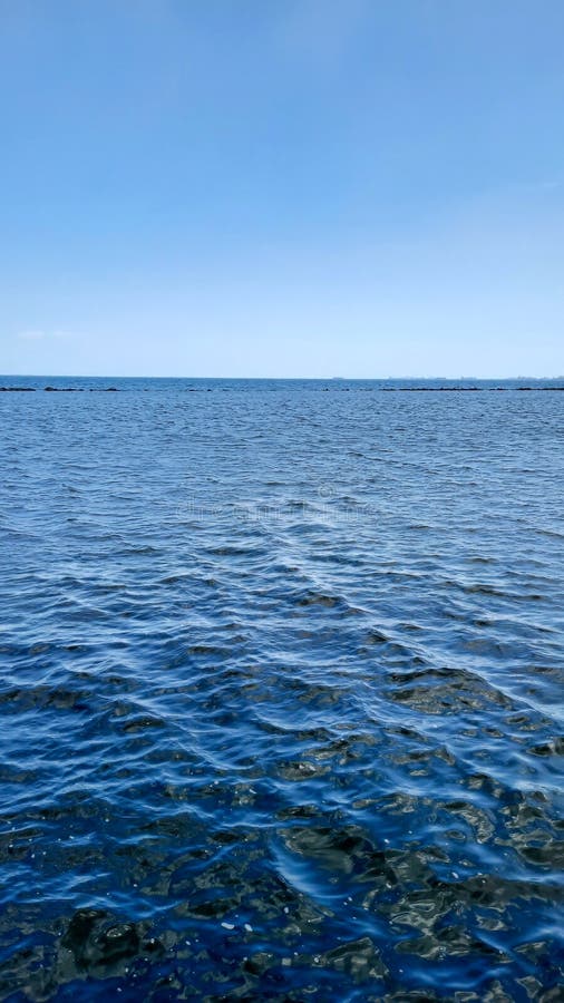 The Beauty of Blue Sky and Sea Stock Photo - Image of wave, ocean ...