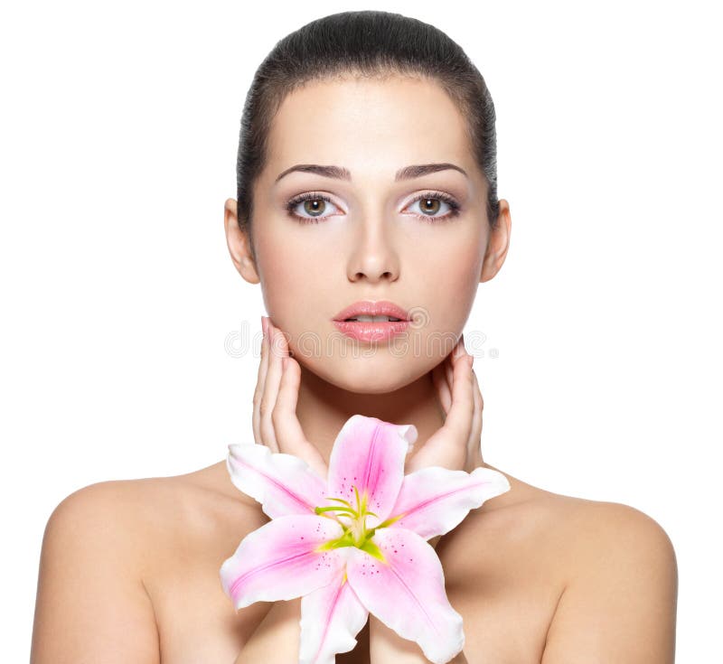 Beautiful Face of Woman with Healthy Skin and Pink Flowers Stock Image ...