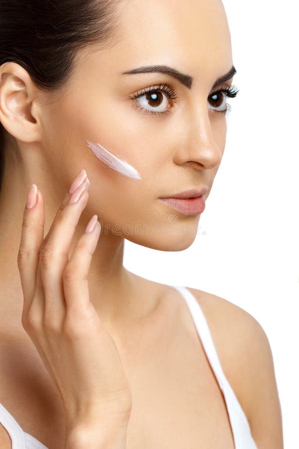 Beaufacial Care Female Applying Cream Portrait Of Young Woman With