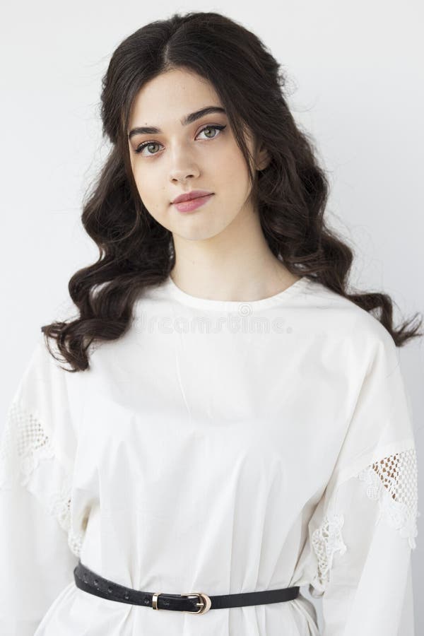 Beauty Front Portrait Of A Pretty Young Woman Wear White Shirt Posing