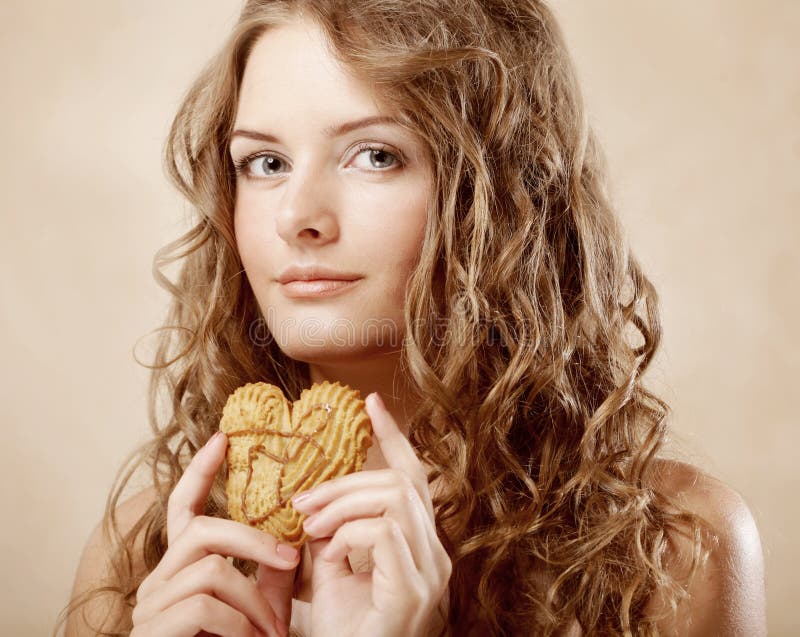 Beauty girl with cookie stock photo. Image of girl, looking - 37793500