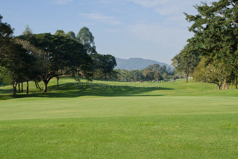 The Beauty of the Golf Course Has Mountains Behind it Stock Image ...